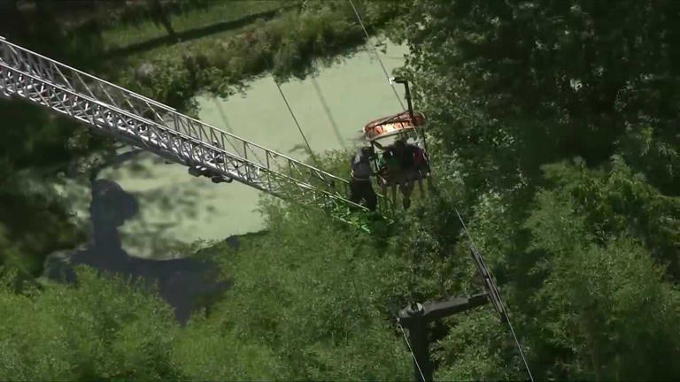 Firefighters seen evacuating passengers from Skyfari ride at Southwick ...