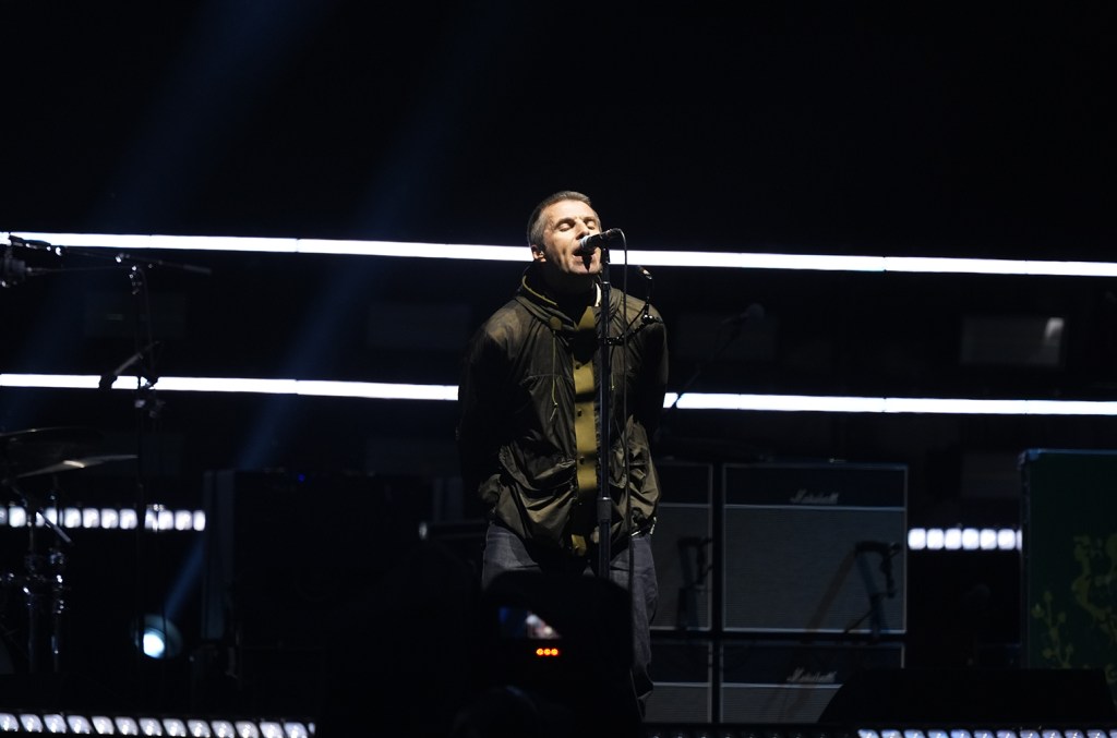 Liam Gallagher Pokes Fun at ‘Snidey' Coldplay Kiss Cam Scandal During Manchester Show