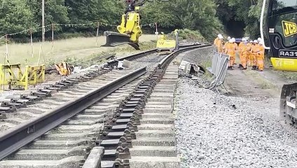 The rail being lowered into place at the Severn Valley Railway
