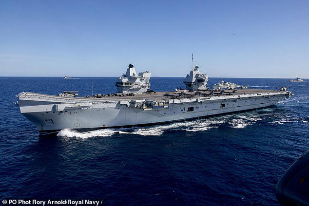 UK and US aircraft carriers steam through Pacific in display of ...