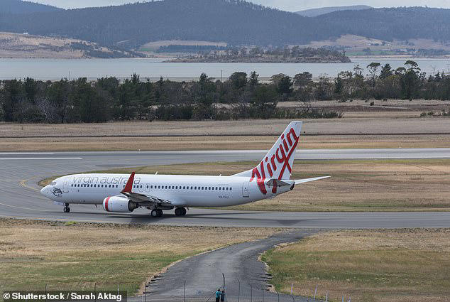 Terrifying moment fire erupts inside plane cabin in mid-air as ...