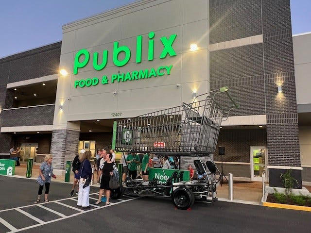 Check out the giant Publix shopping cart driving around St. Lucie County