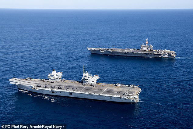 UK and US aircraft carriers steam through Pacific in display of ...