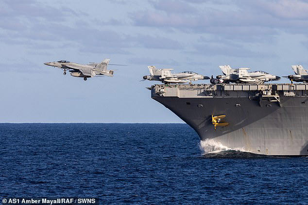 UK and US aircraft carriers steam through Pacific in display of ...