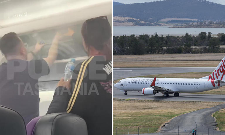 Terrifying moment fire erupts inside plane cabin in mid-air as ...