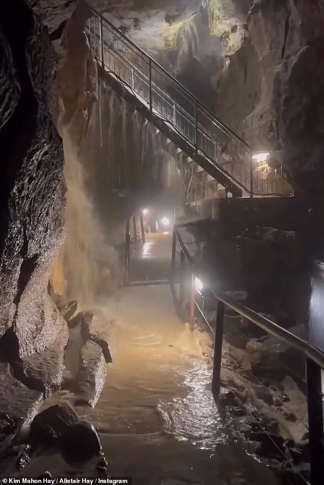 Tourists flee for lives as cave floods in torrential downpour - amid ...