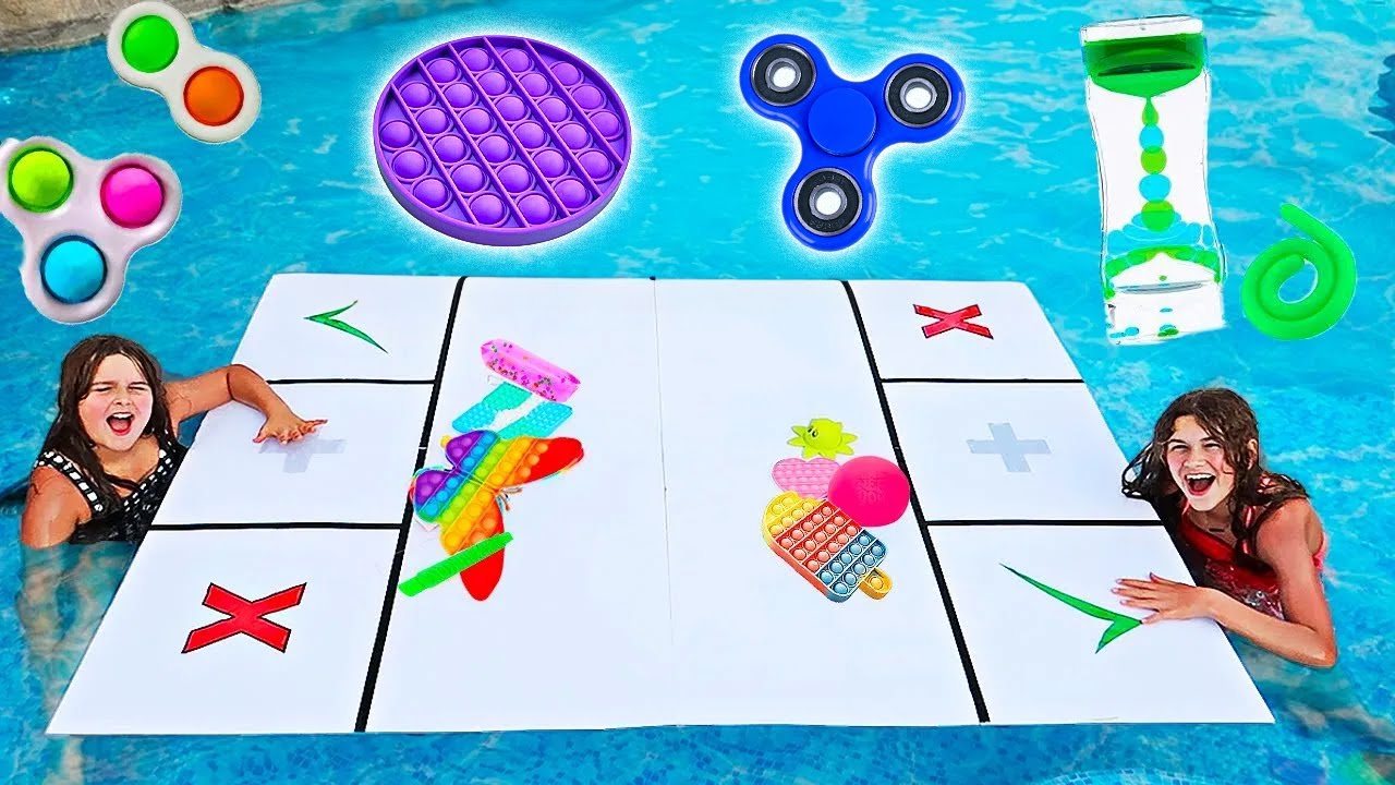 FIDGET TOYS IN THE POOL!! | JKREW
