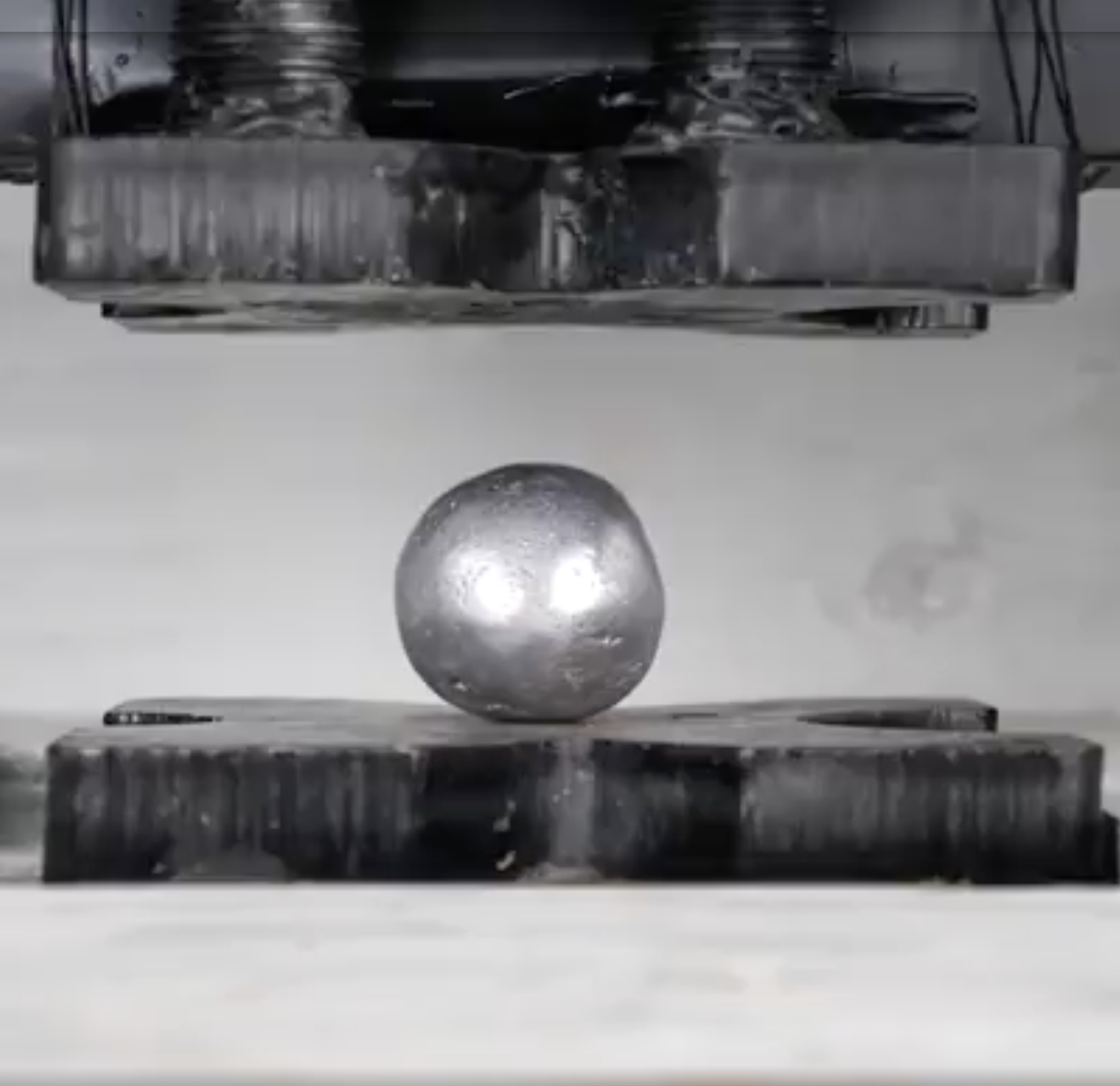 Crushing a foil ball with hydraulic pressure