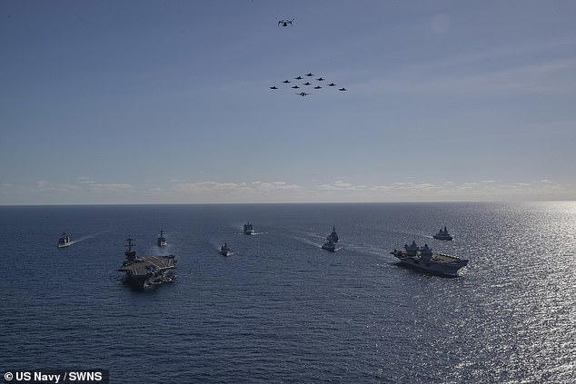 UK and US aircraft carriers steam through Pacific in display of ...