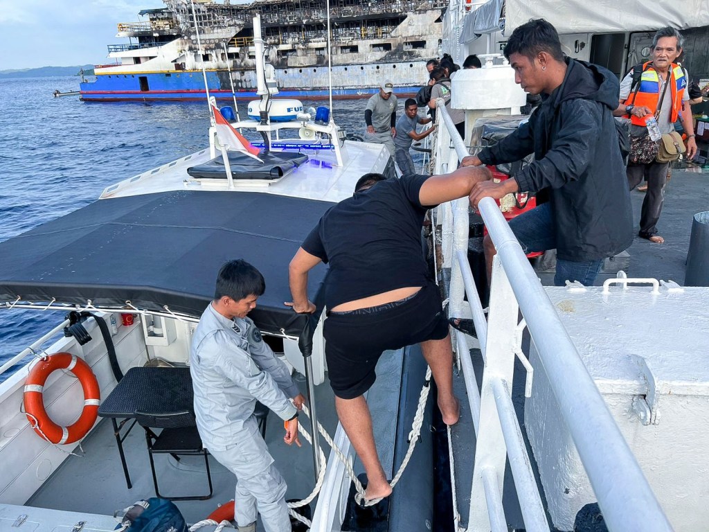 Ship carrying hundreds catches fire in Indonesia as frightened ...