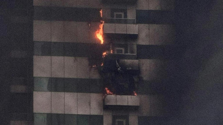 Man Teeters On Edge Of High-Rise To Save Babies From Burning Building