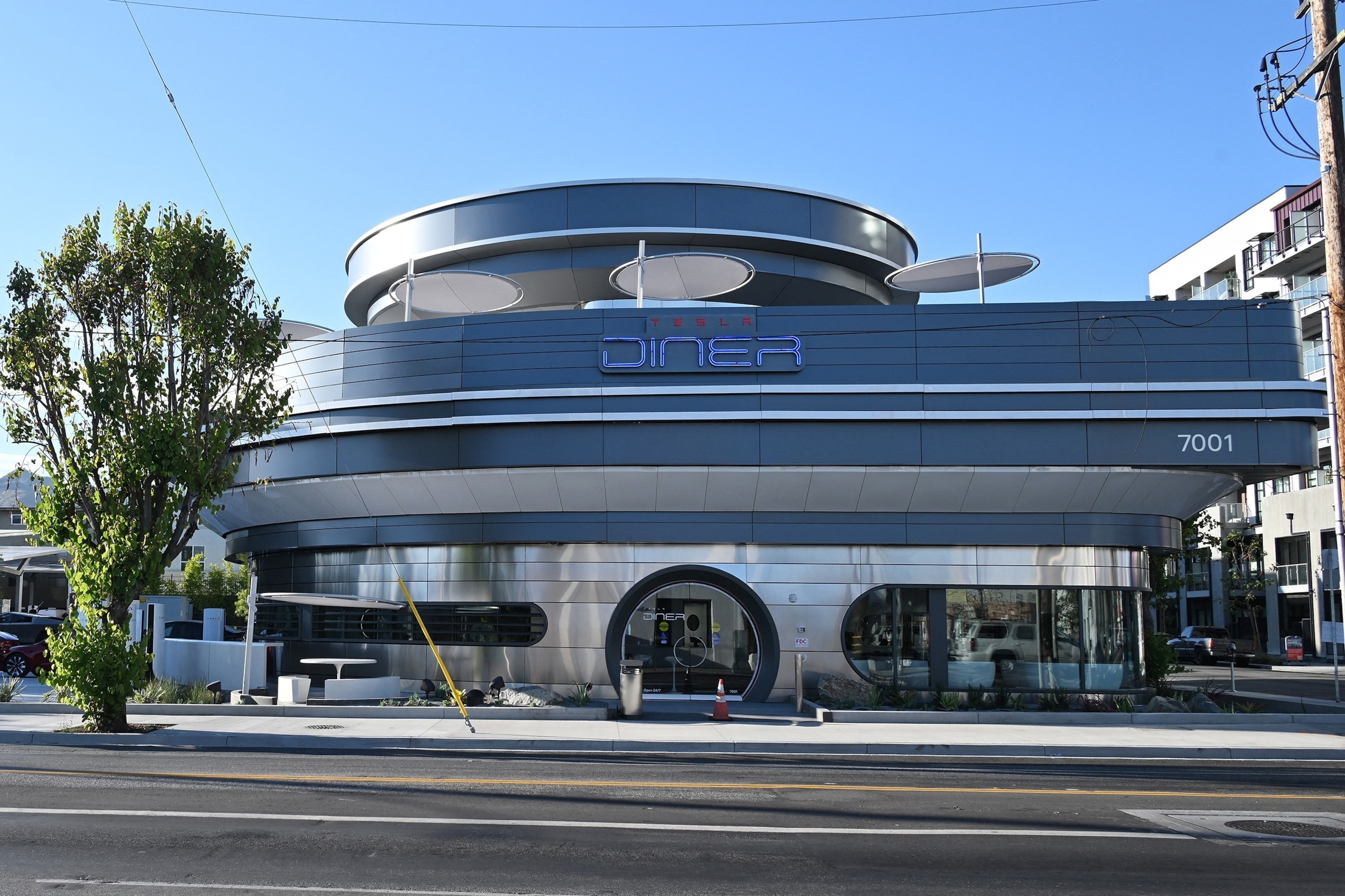 Tesla's new Hollywood diner: Roller skating servers, EV charging and ...