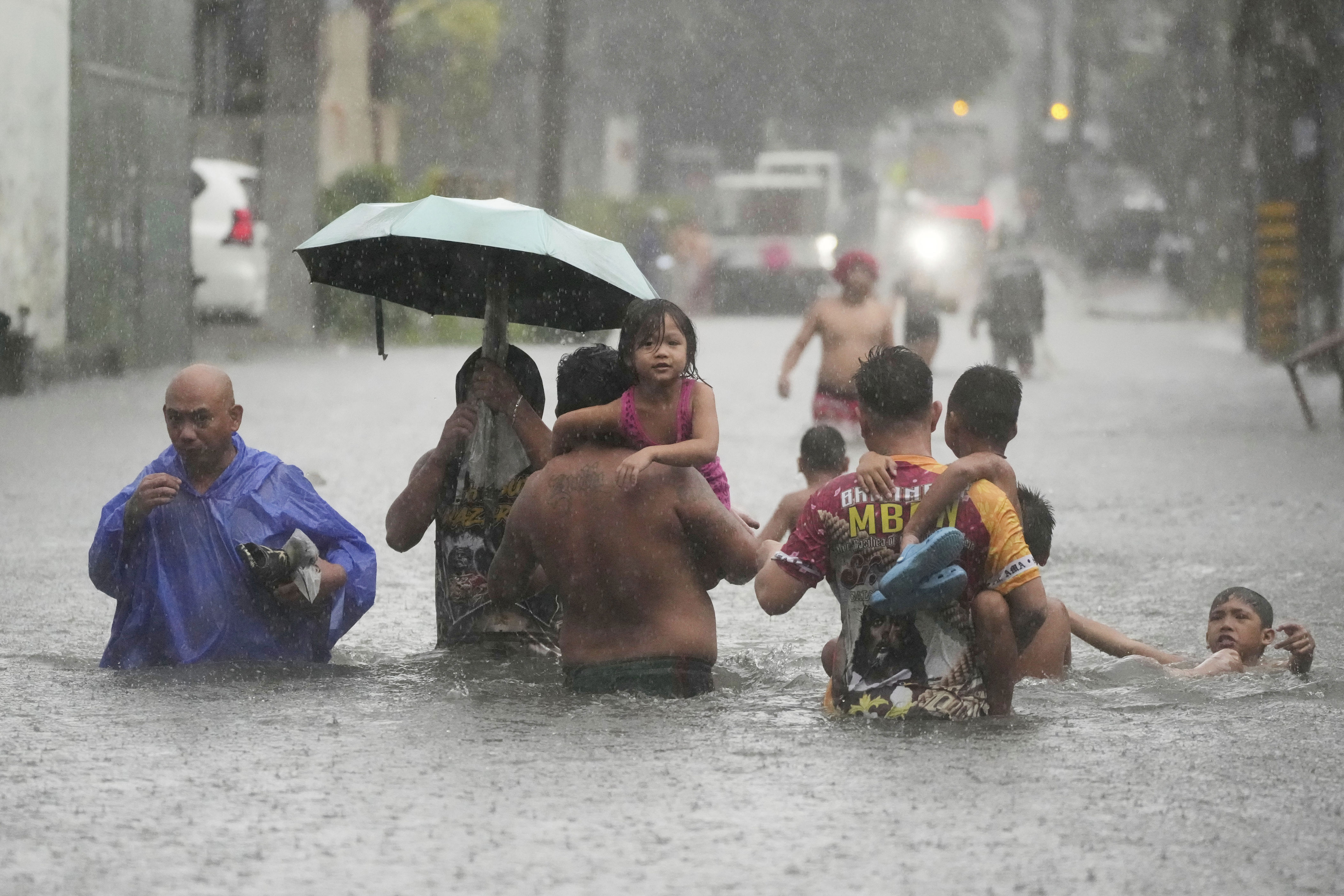 Typhoon Wipha whips Vietnam as Philippines flooding displaces thousands
