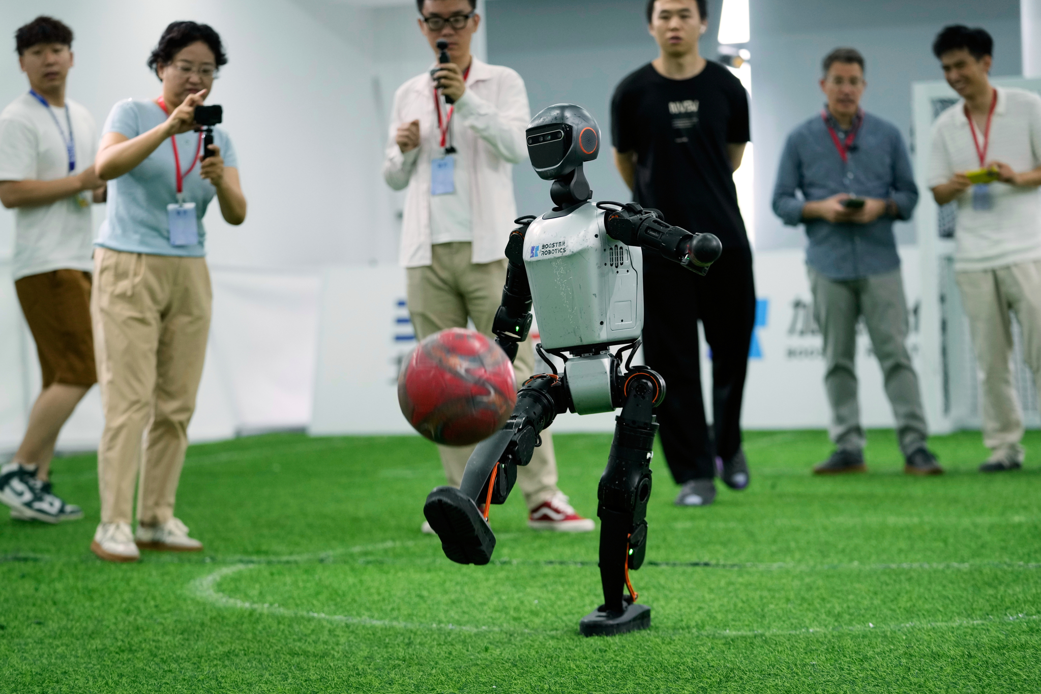 China's soccer playing robots reign supreme at RoboCup in Brazil