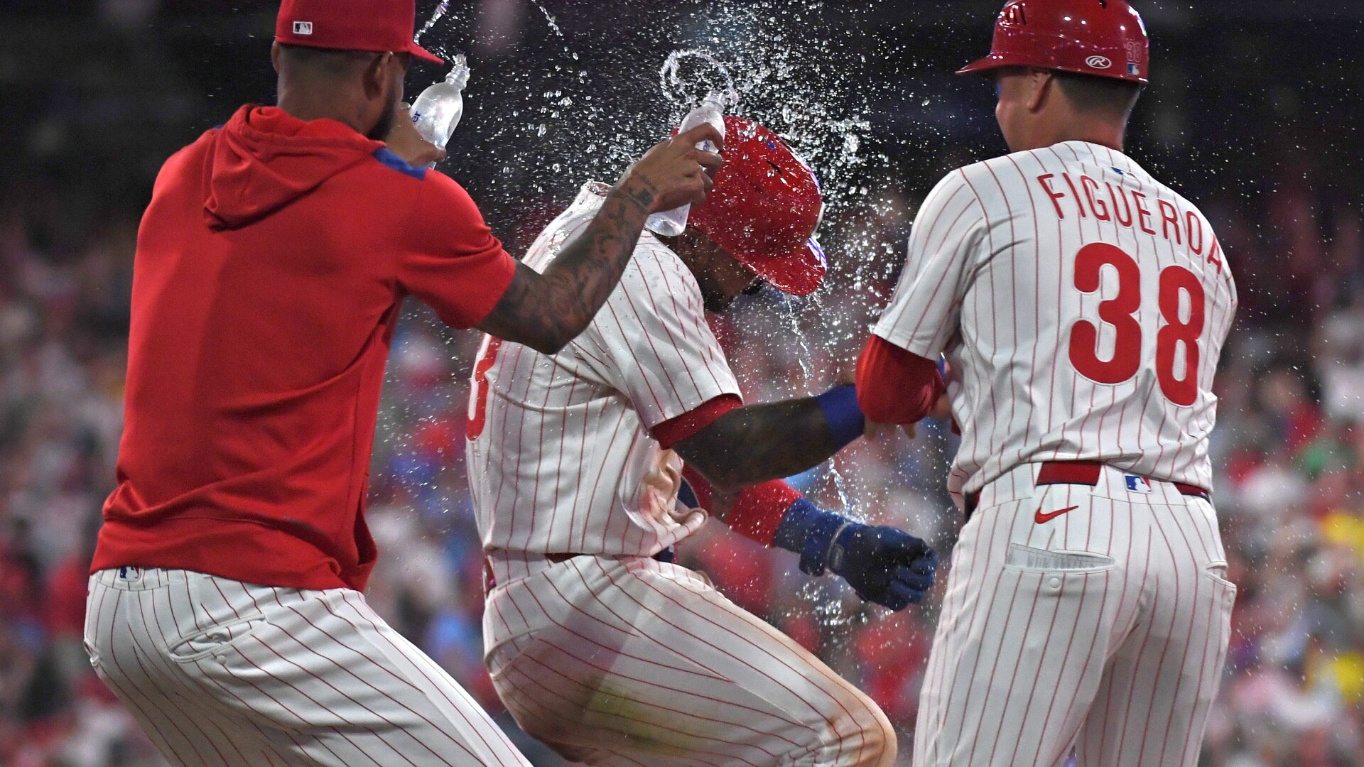 Phillies claim another wild, walk-off win on catcher's interference ...