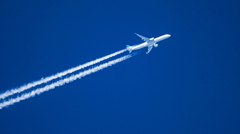 Ever Wonder Why Some Airplanes Leave White Lines In The Sky?