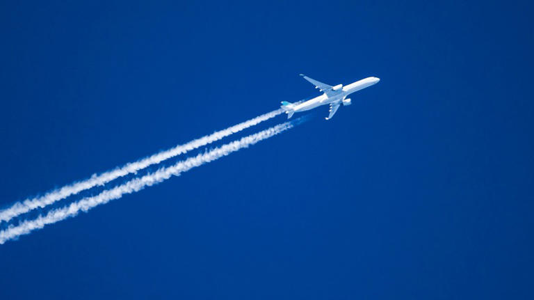 Ever Wonder Why Some Airplanes Leave White Lines In The Sky?