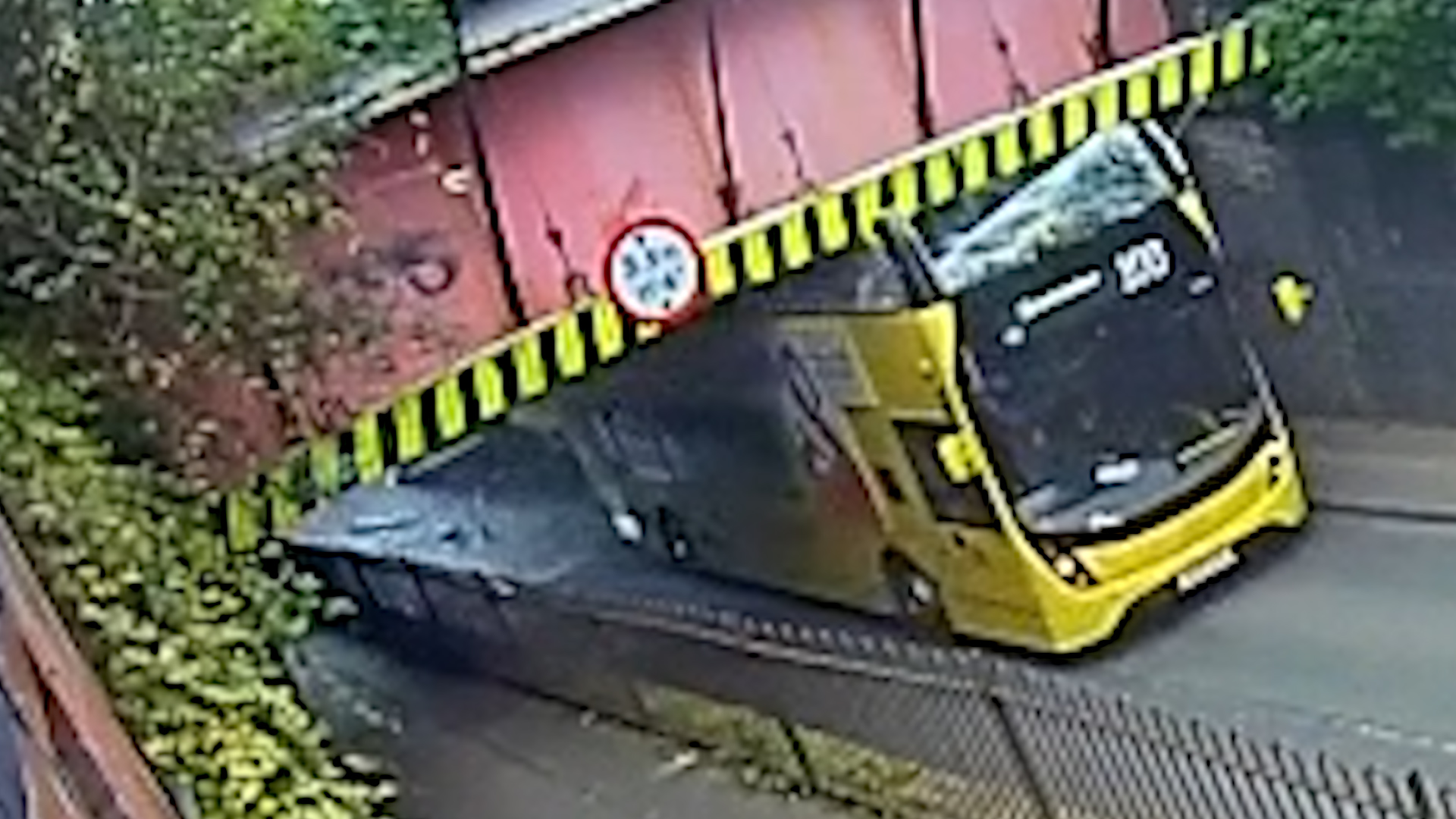 Shocking moment double-decker smashes into Manchester aqueduct