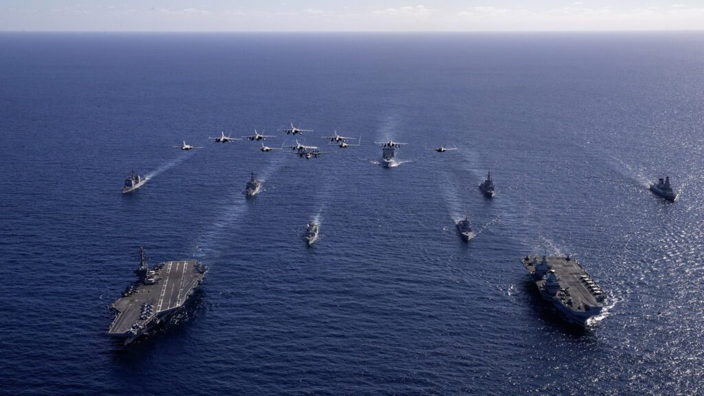 Show of force as Royal Navy sails with US Carrier in power display