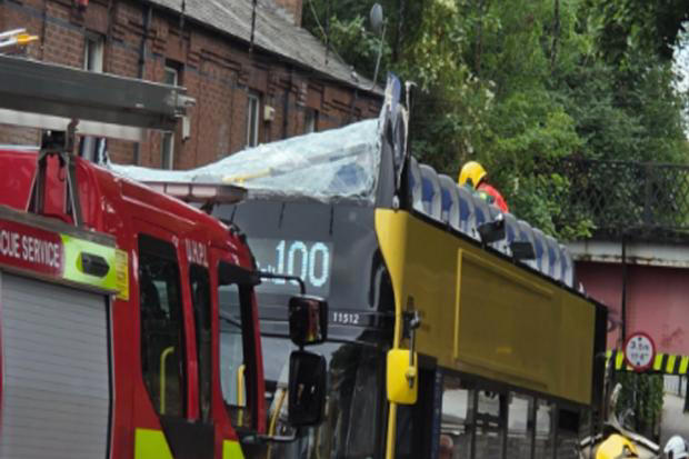 Three seriously injured as roof ripped from bus from Warrington after ...