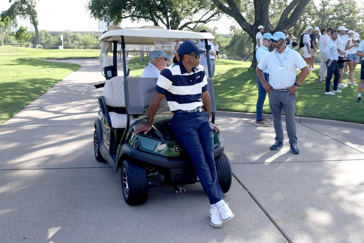 Tiger watches son’s tough start at US Junior Amateur