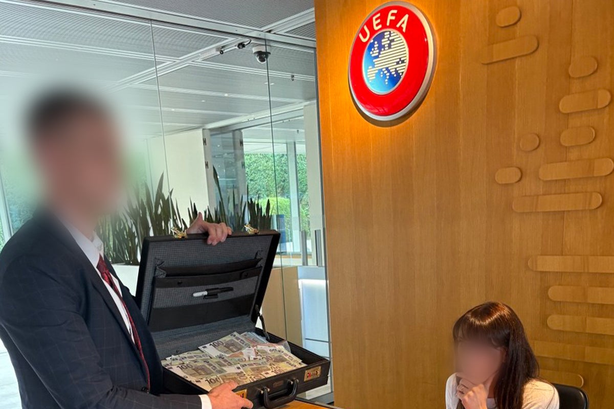 Crystal Palace ultras deliver suitcase of fake money to Uefa HQ in ...