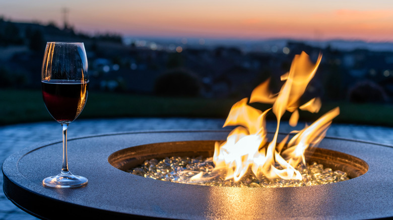 The Yard Fire Pit Placement Mistake That's Hurting Your Home's Value