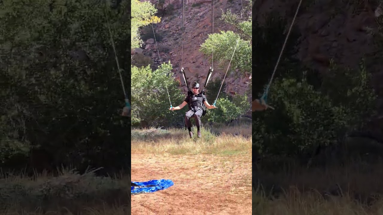 BASE jumper landing from an epic jump