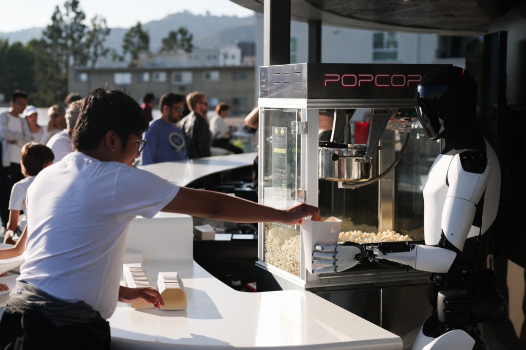 Inside Elon Musk’s Tesla diner where robots serve the food