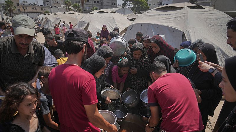 Displaced Gazans live in tents at bombed stadium in Gaza City