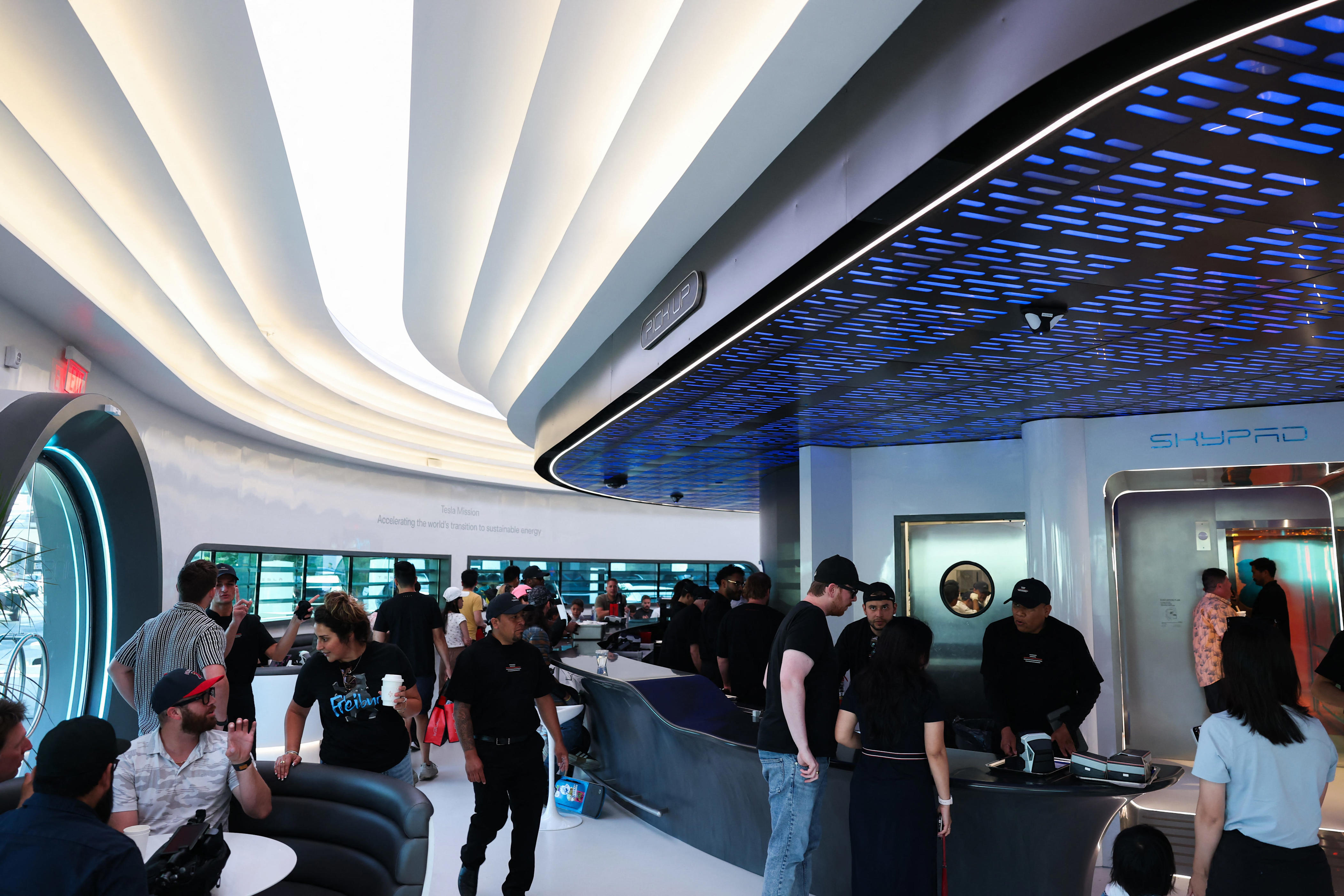 Photos show the Tesla Diner's grand opening in Hollywood, which Elon ...