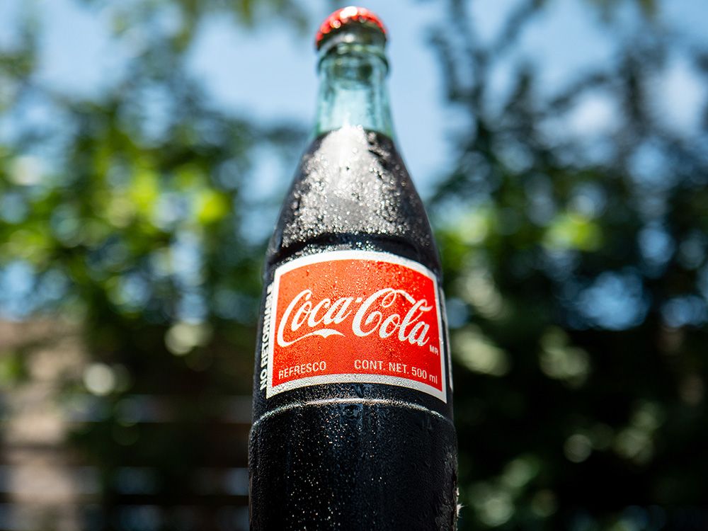 Coca-Cola to release new Coke with sugar. Trump says it's 'better' than ...
