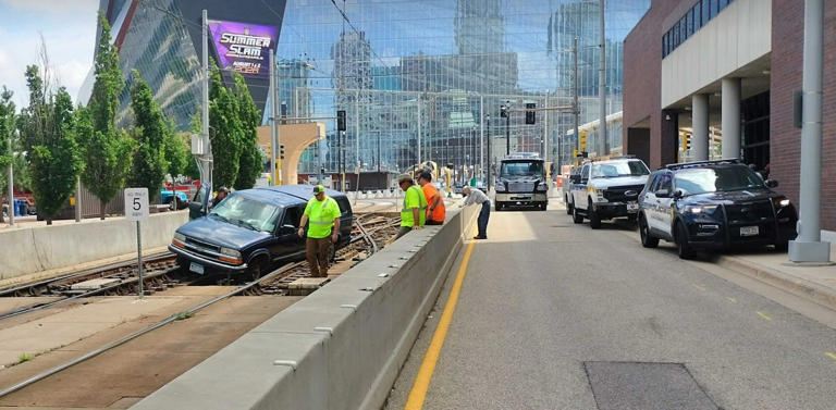 Vehicle gets stuck on light-rail tracks in downtown Minneapolis ...