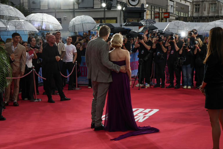 Pamela Anderson kisses co-star Liam Neeson on red carpet after his confession about being ‘madly ...