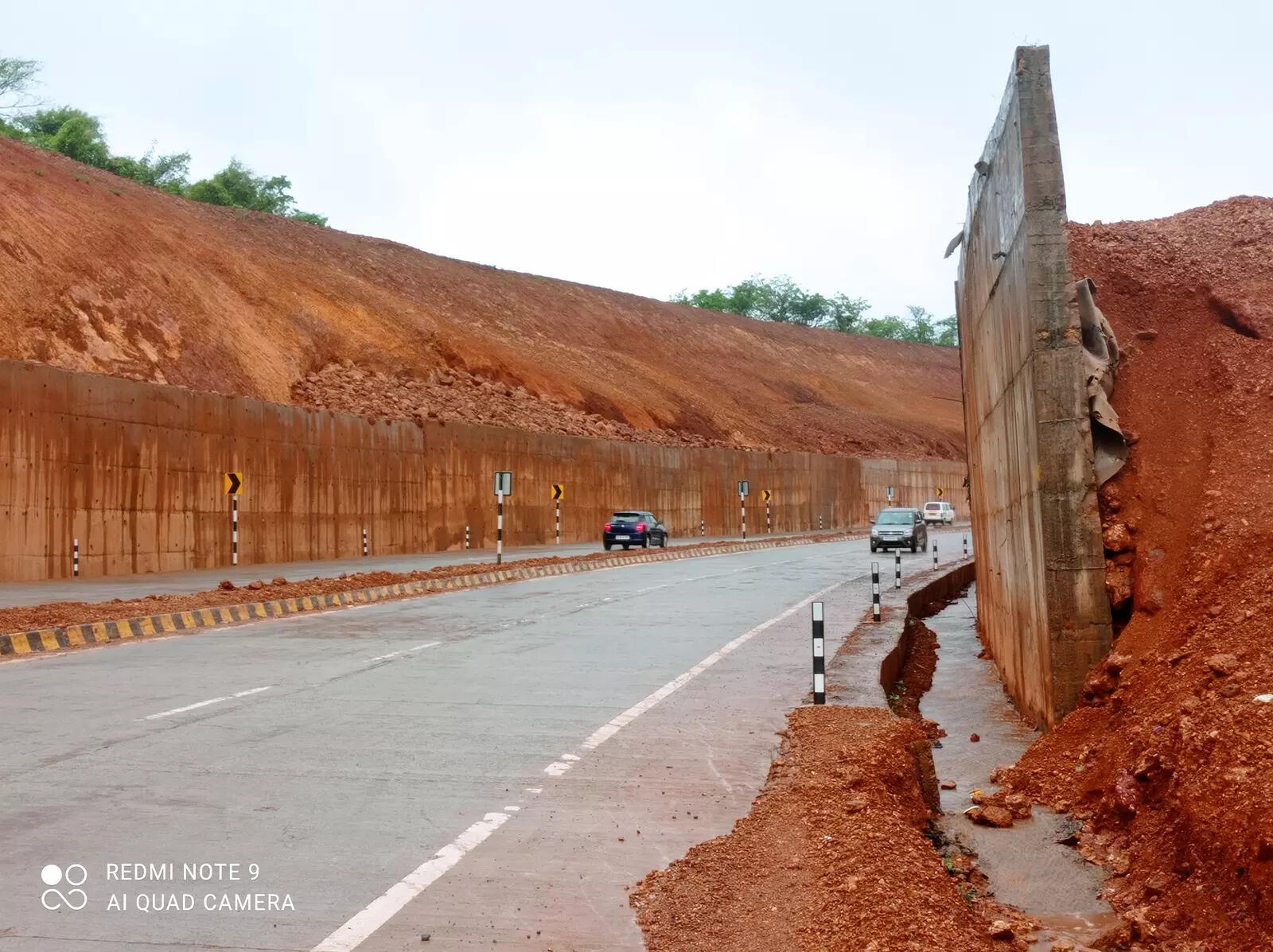 Retaining wall along Malepm highway shows signs of pressure