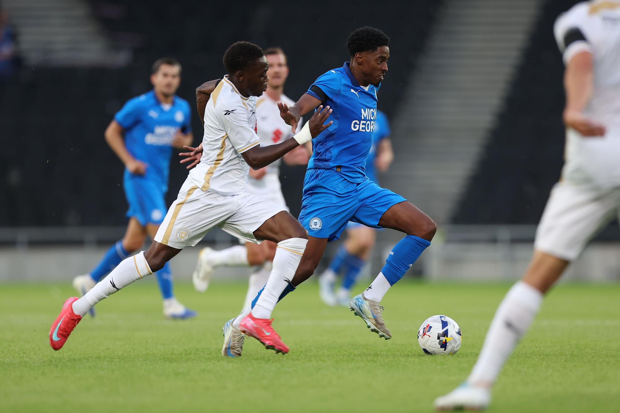 Peterborough United paper over the cracks at MK Dons thanks to two ...
