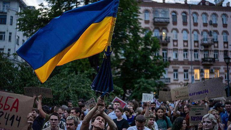 Thousands gather in Ukraine to protest as Zelenskyy signs bill ...