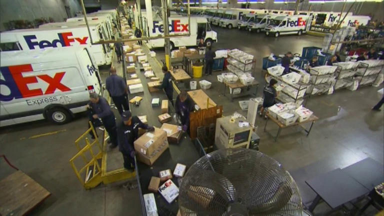 Worker hospitalized after fire at FedEx World Hub