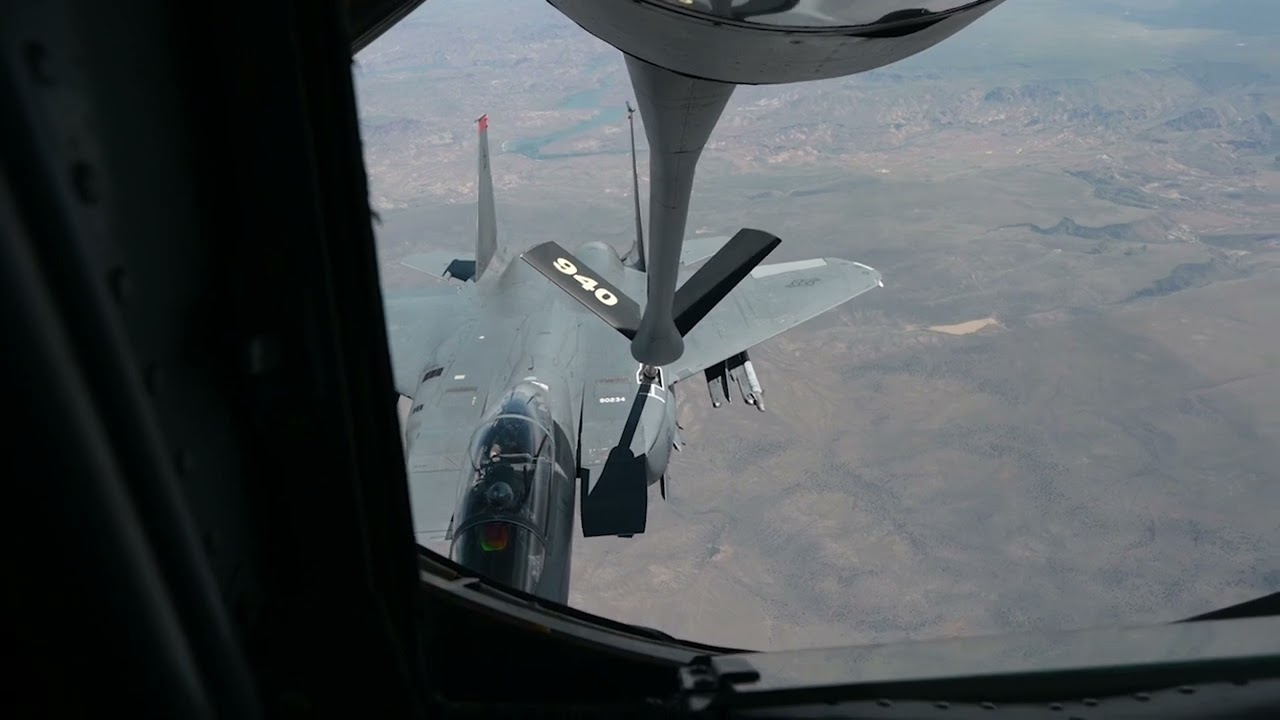 KC-135 Stratotanker Executes Mid-Air Refueling of F-15E Over Idaho