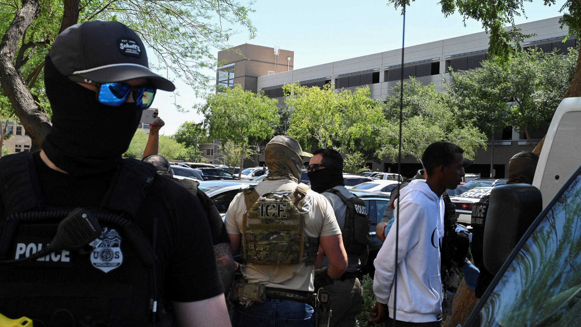 Masked ICE agents spark debate over law enforcement accountability ...