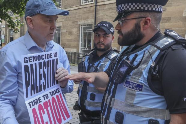 Palestine protester fears for freedom of speech after arrest over sign