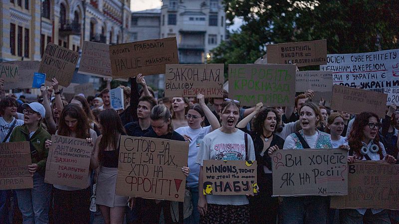 Thousands gather in Ukraine to protest as Zelenskyy signs bill ...