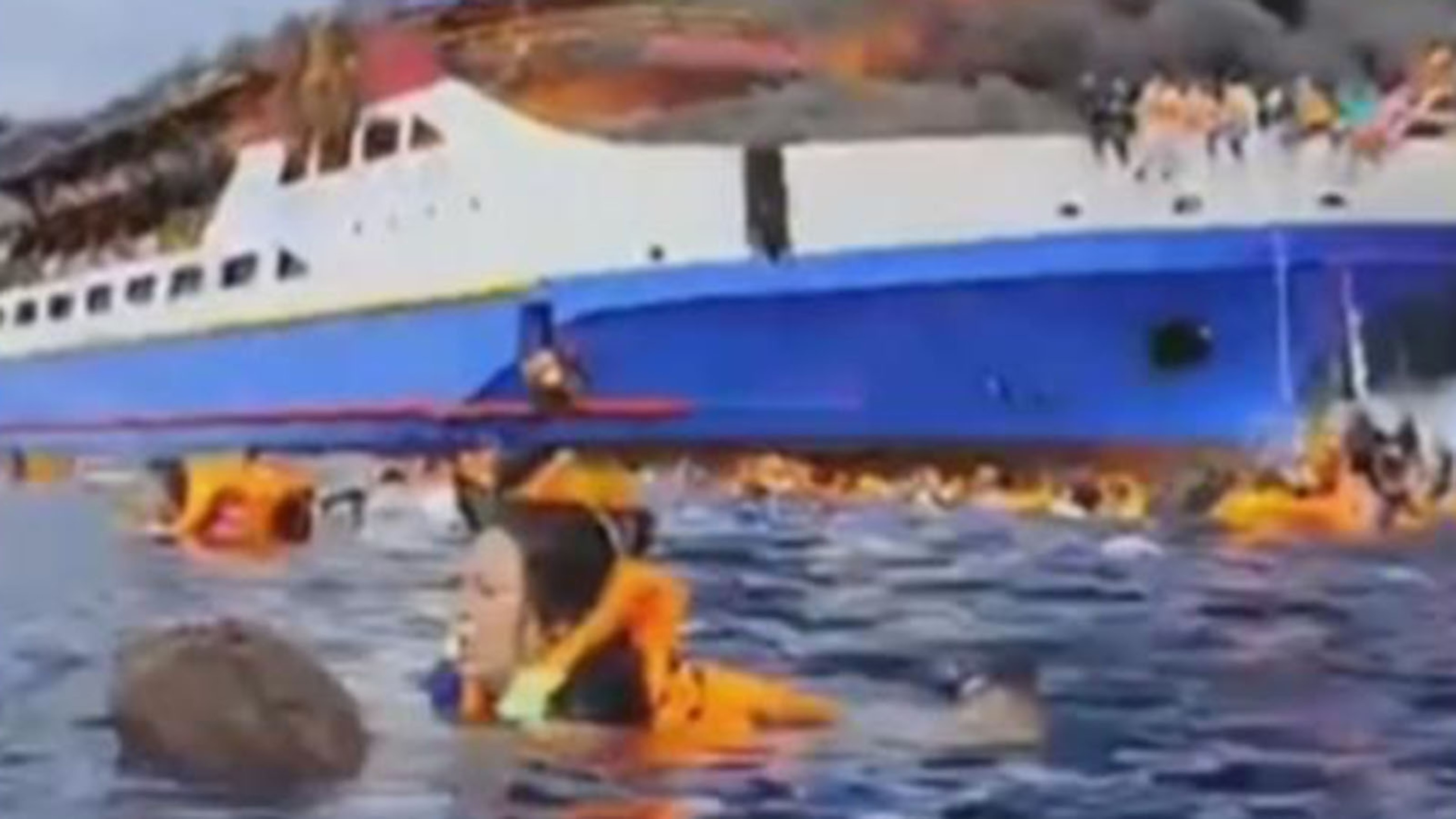 Dramatic video shows people in the water after ferry caught fire