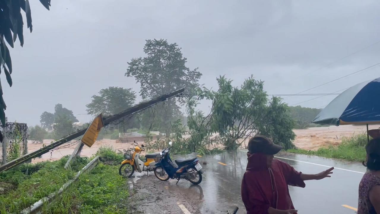 Powerlines dragged down by raging river amid Typhoon Wipha onslaught