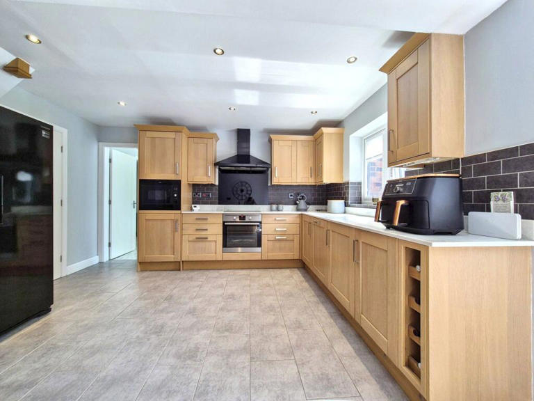 This detached £450,000 five-bedroom home is perfectly set up for families