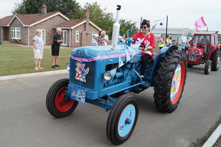 Tractor-driving fundraisers endure wind and rain to raise thousands for ...
