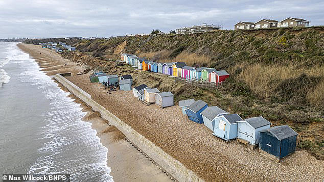 Local council removes £1million cliffside beach huts at risk of falling ...