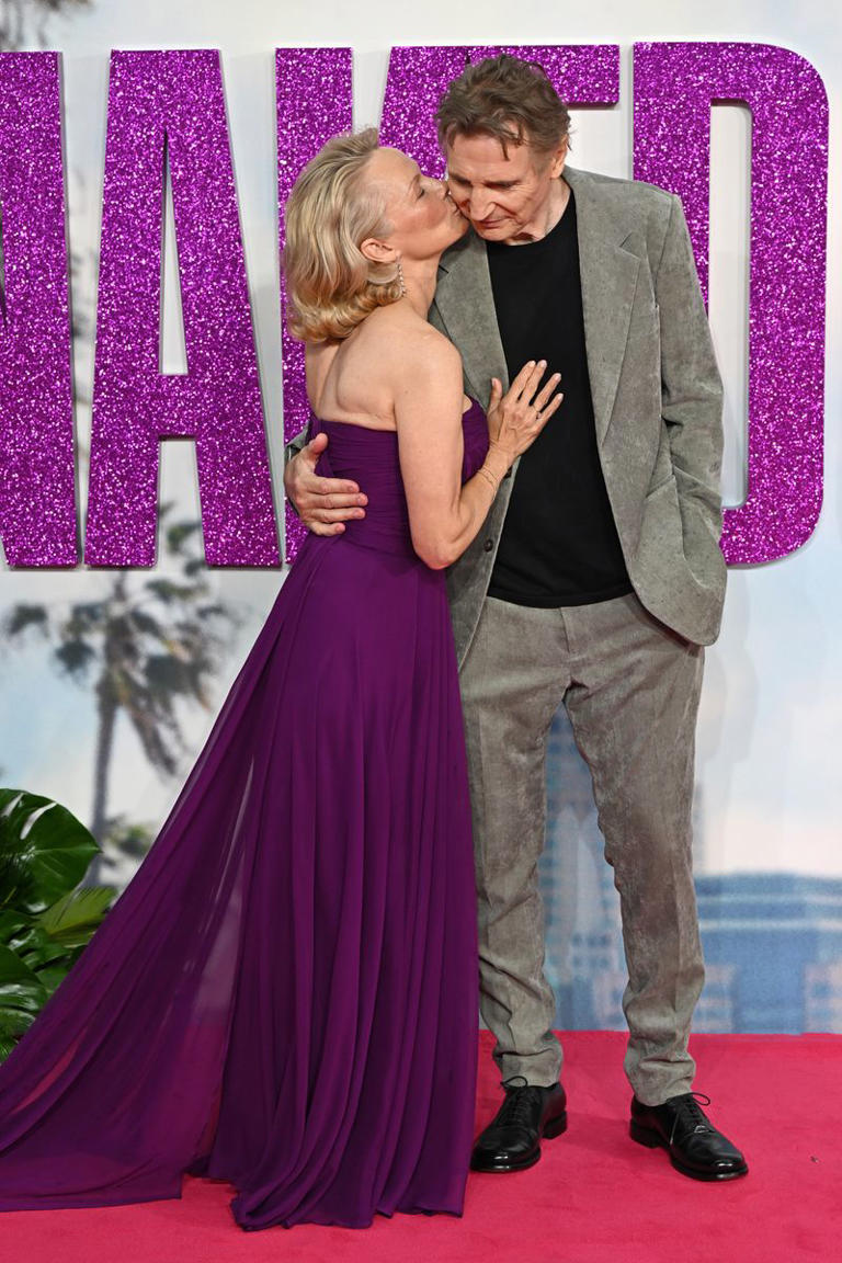 Pamela Anderson Channels Jackie O in a Leopard Pillbox Hat and Curled Bob