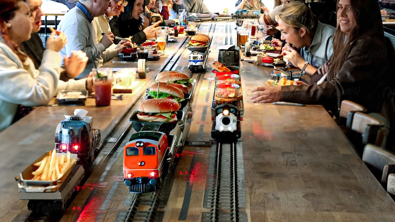 Unique restaurant uses trains to serve burgers to customers