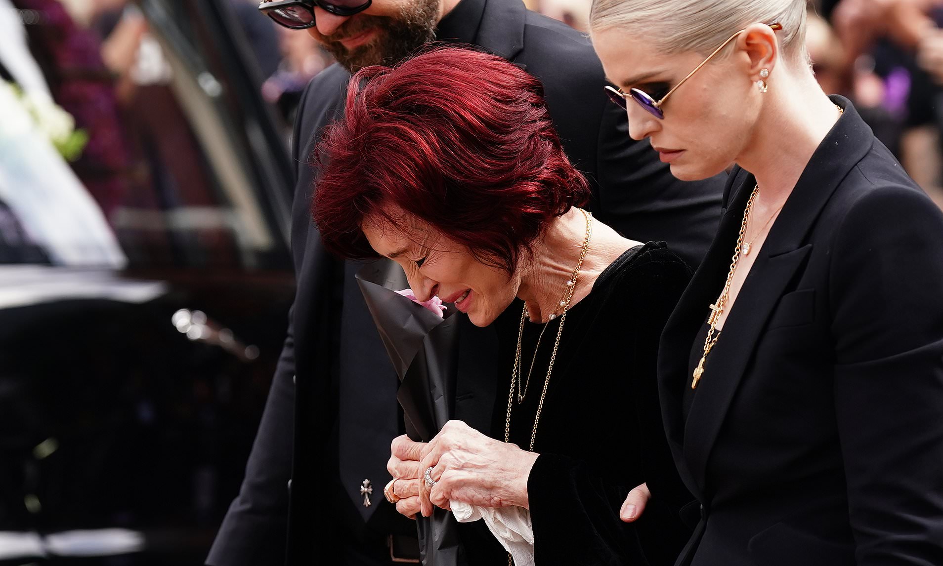 Frail Sharon Osbourne breaks down in tears and is supported by family ...